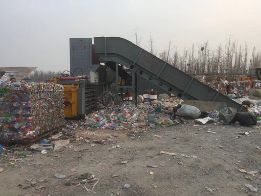 China YDWM190 Horizontal Closed Type Waste Plastic Baling Machine with Conveyor from HFbaler supplier